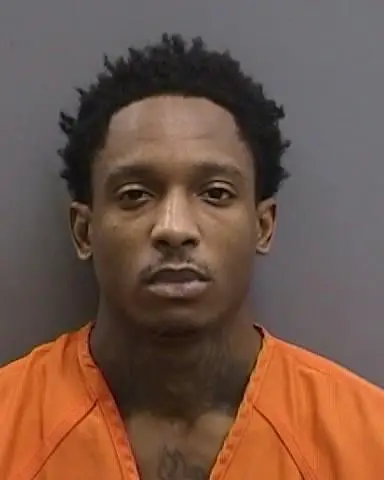 LATRELL MIGNOTT booked for 0.00