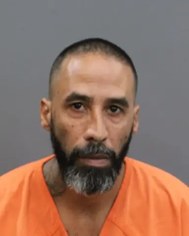 AARON MUNIZ booked for