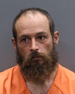BRETT CROSBY booked for 0.00