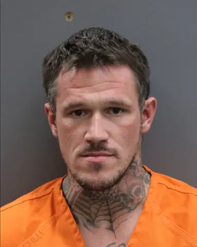 TRAVIS WRIGHT booked for 500.00